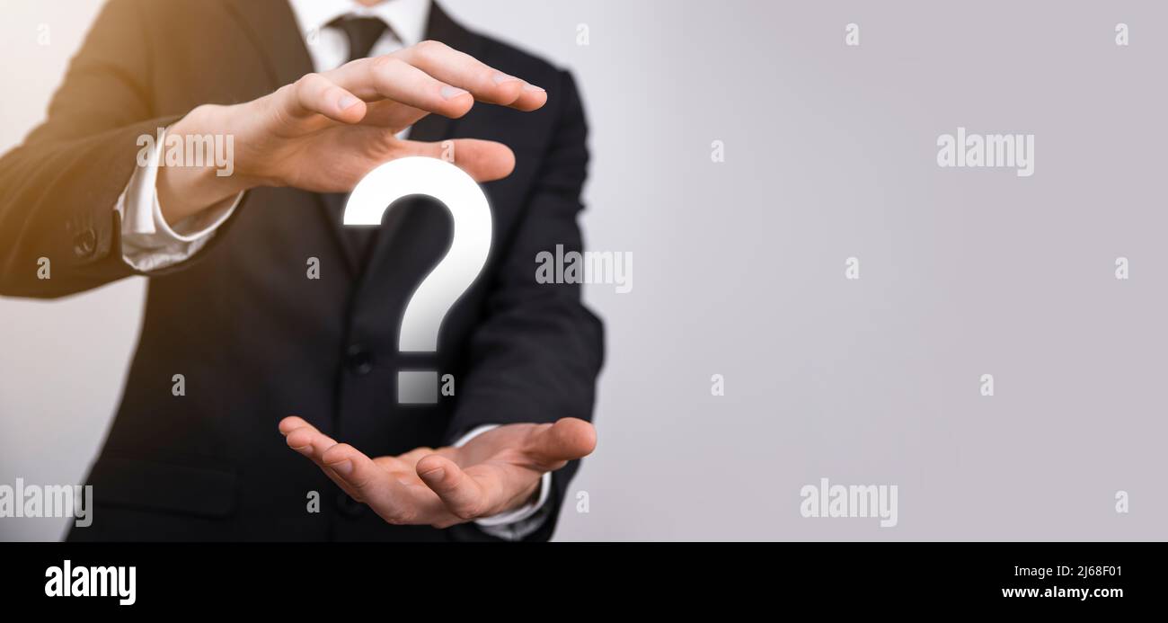 Male hand holding question mark icon on neon red,blue,purple background ...