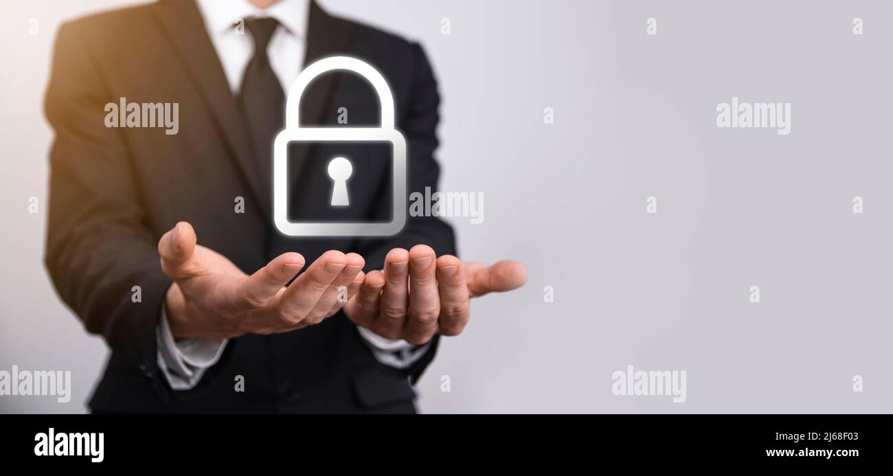 Male hand holding a lock padlock icon.Cyber security network. Internet ...