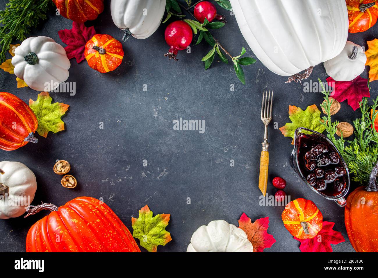 Thanksgiving Table setting Background. White orange pumpkins, colorful ...