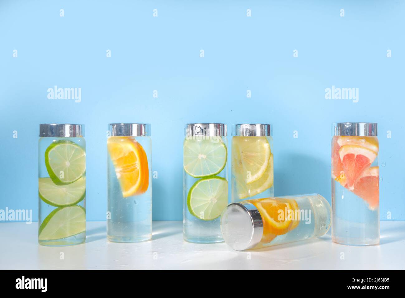 Variety of cold drinks in bottles, summer infused water bottles ...