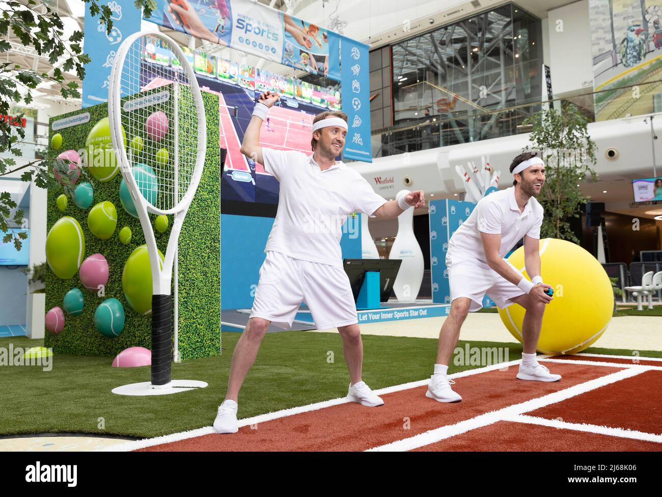 EDITORIAL USE ONLY Actors Tom Felton (left) and Matt Lewis compete in a ...
