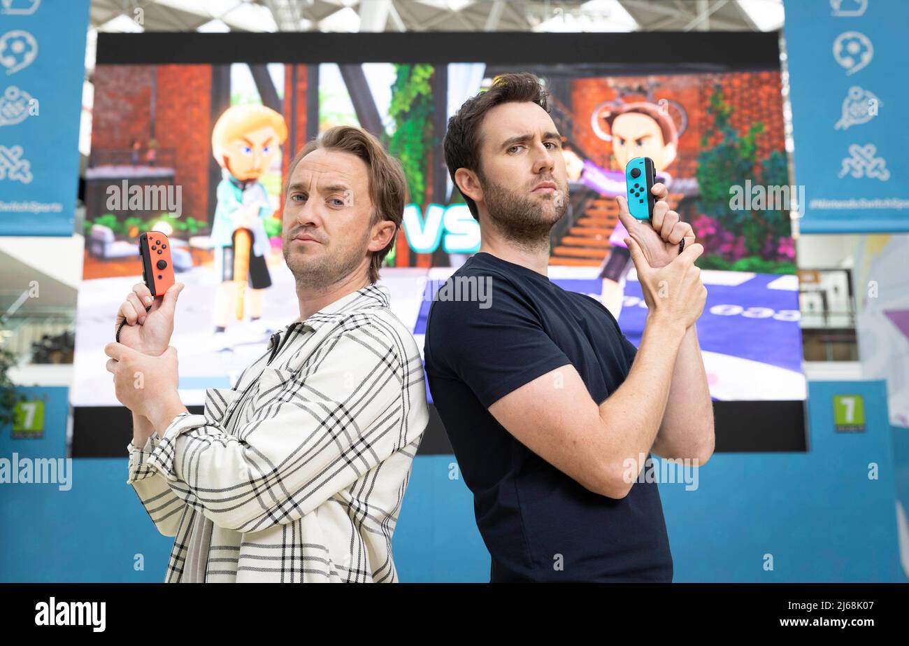 EDITORIAL USE ONLY Actors Tom Felton (left) and Matt Lewis compete in a ...