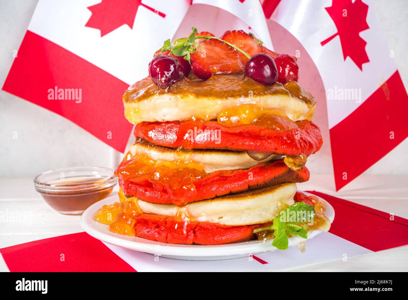 Canada Day concept, brunch menu background. Stack of red and white ...