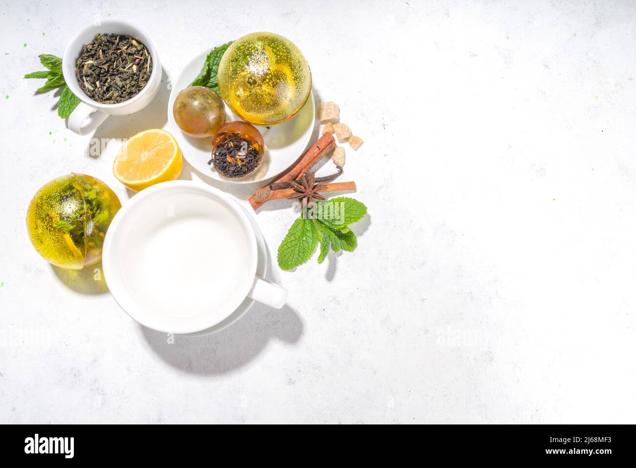 Making tea with Trendy modern tea ball bombs. Tea balls with dried tea ...