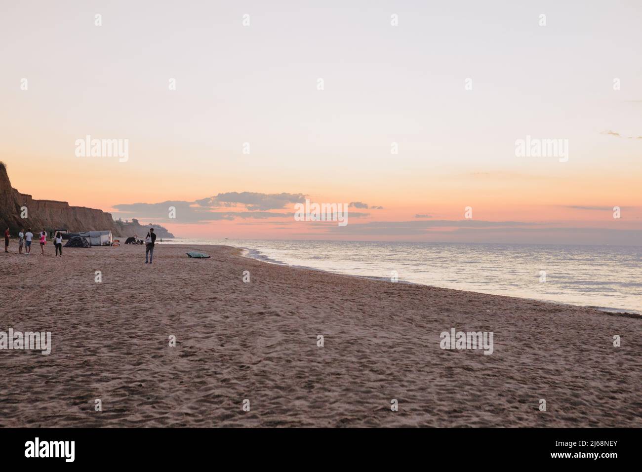view of sunrise above the sandy sea beach. copy space Stock Photo - Alamy