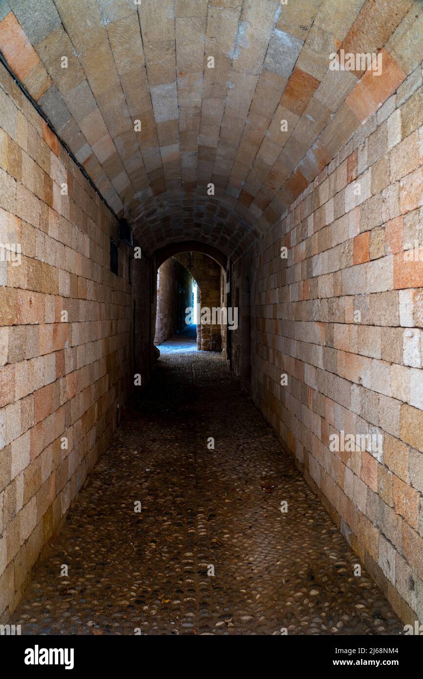 A medieval Corridor in the Street of the knights in Rhodes Greece Stock ...