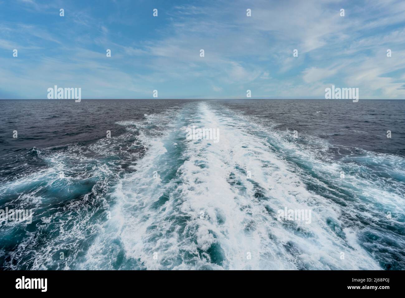 In the Atlantic Ocean, the wake from Cunard's RMS Queen Elizabeth's ...