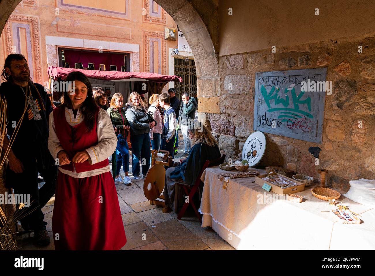 the medieval fair of Montblanc, with children playing as ancient ...