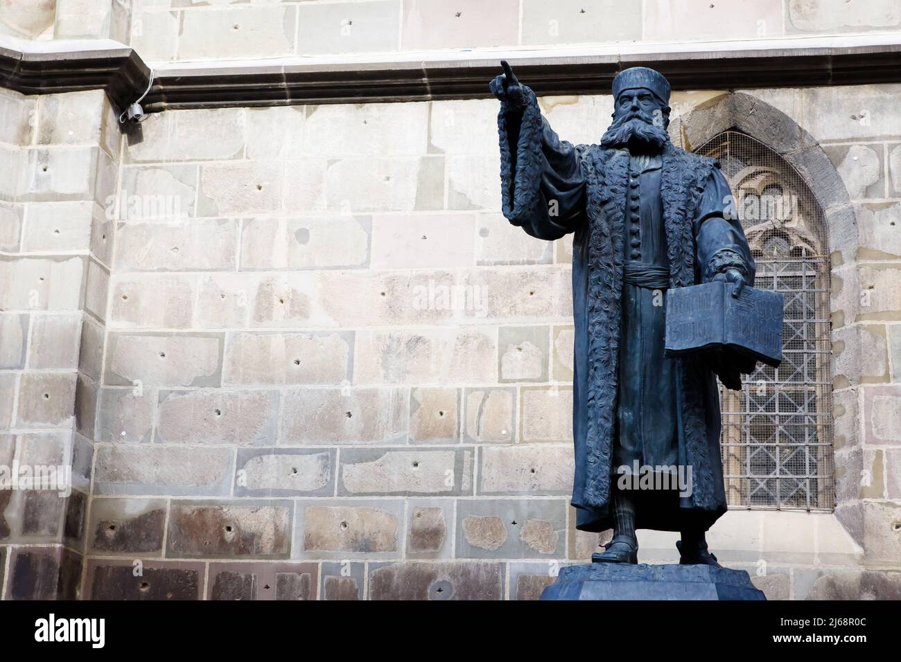 The statue of Honterus in Brasov, Romania, near the Black Church (a ...