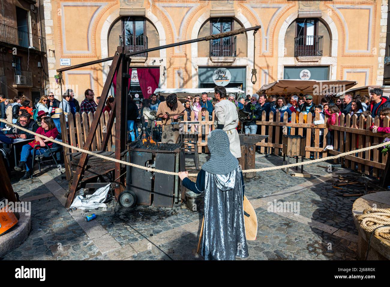 the medieval fair of Montblanc, with children playing as ancient ...