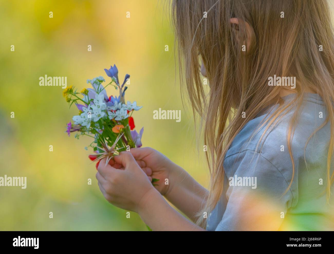 Happy Child in Spring Garden Stock Photo - Alamy