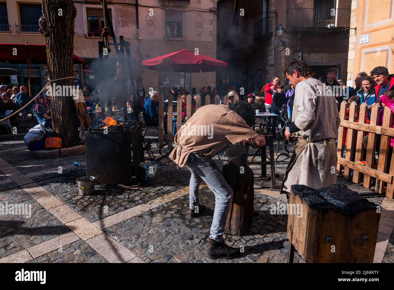 the medieval fair of Montblanc, with children playing as ancient ...