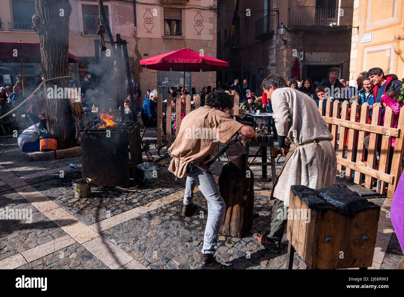 the medieval fair of Montblanc, with children playing as ancient ...