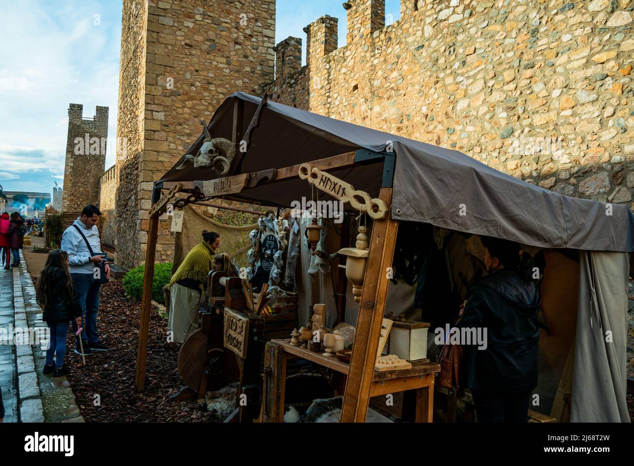 the medieval fair of Montblanc, with children playing as ancient ...