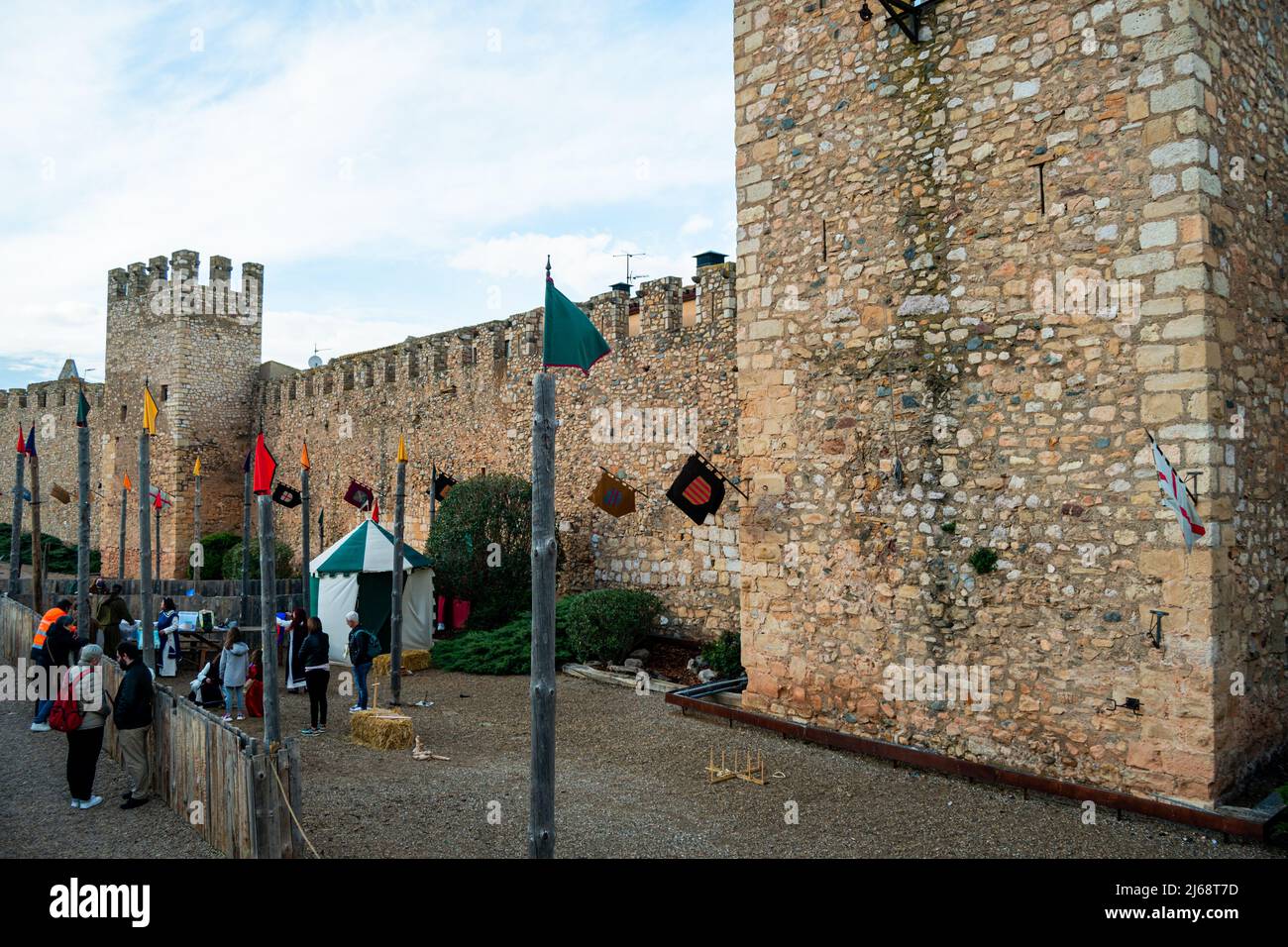 the medieval fair of Montblanc, with children playing as ancient ...
