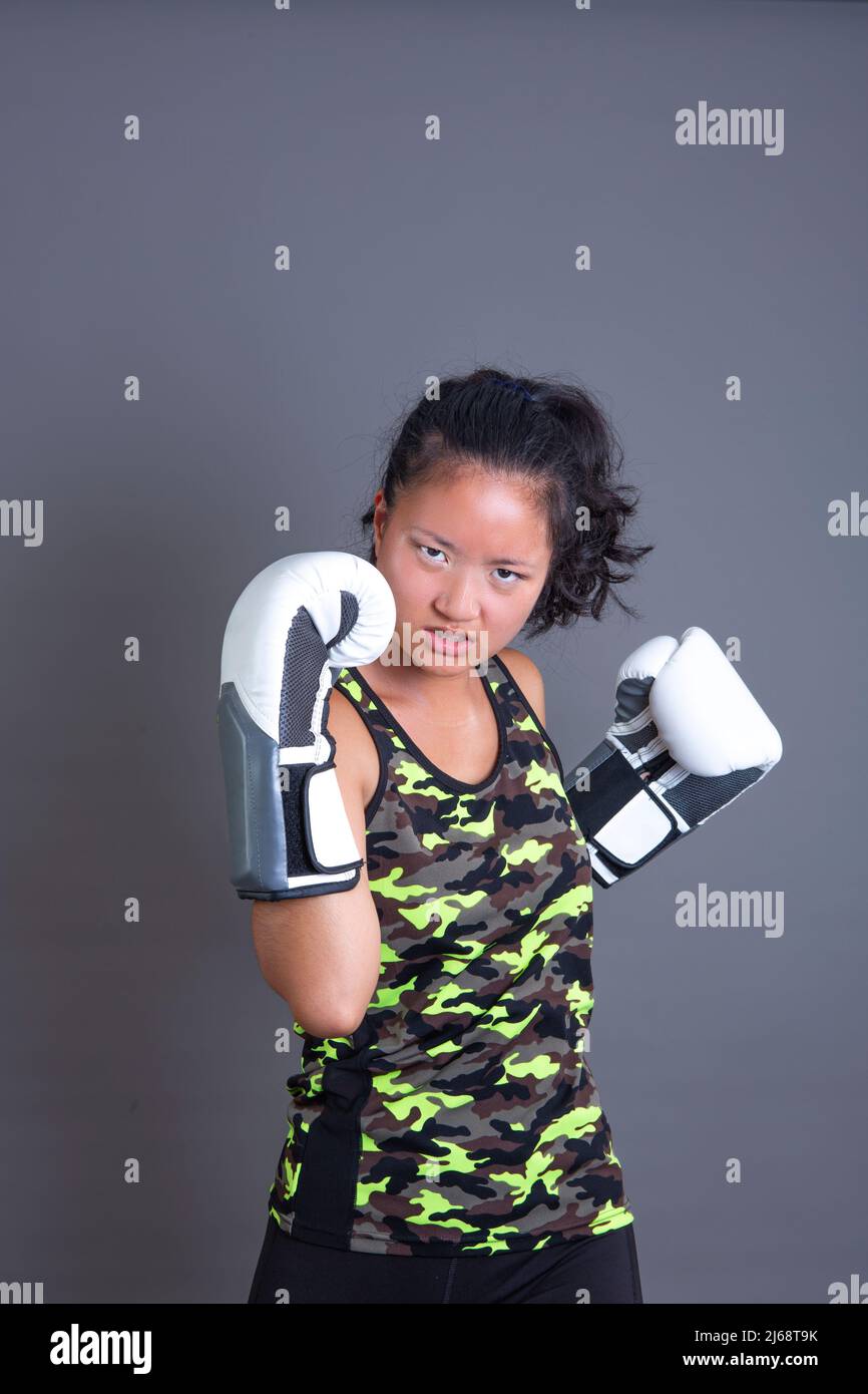 young asian ethnicity woman with boxing gloves Stock Photo - Alamy