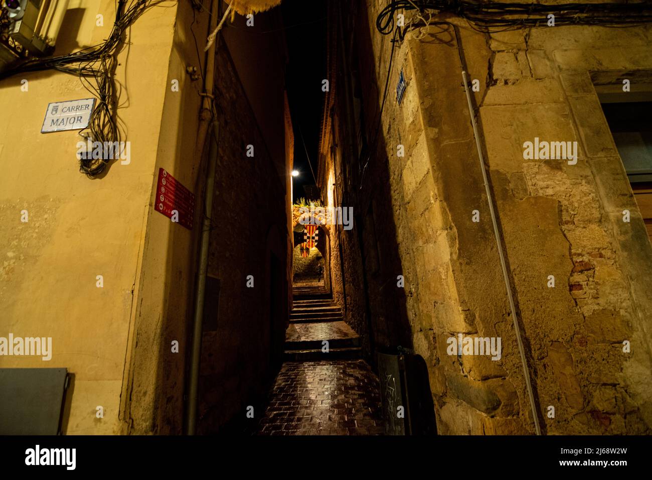 the medieval fair of Montblanc, with children playing as ancient ...