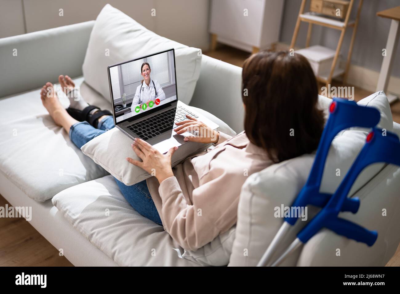 Patient Watching Online Video Consultation With Doctor Stock Photo - Alamy