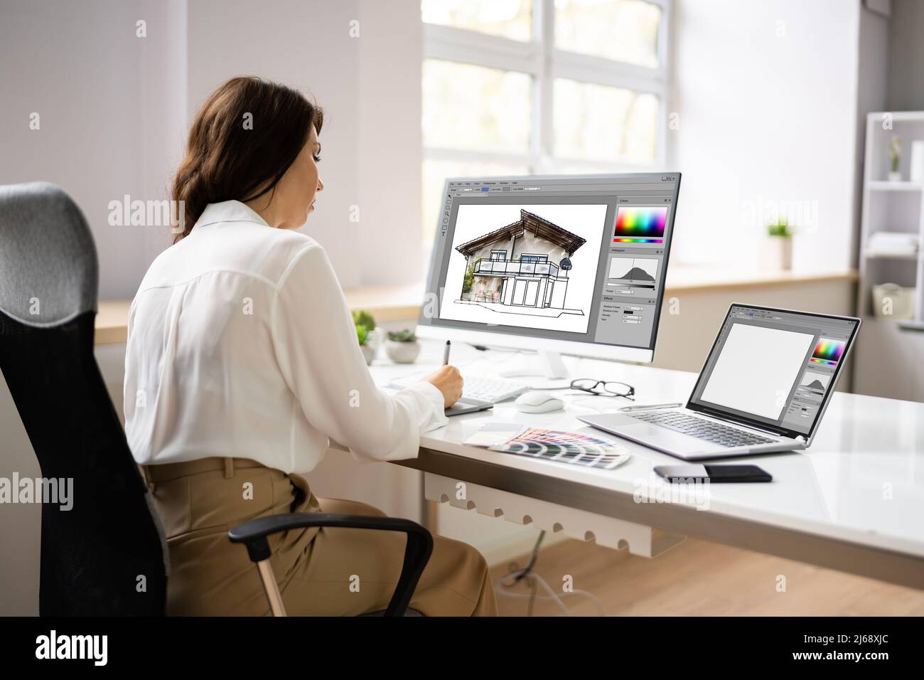 House Designer And Decorators Using Computer For Design Stock Photo - Alamy