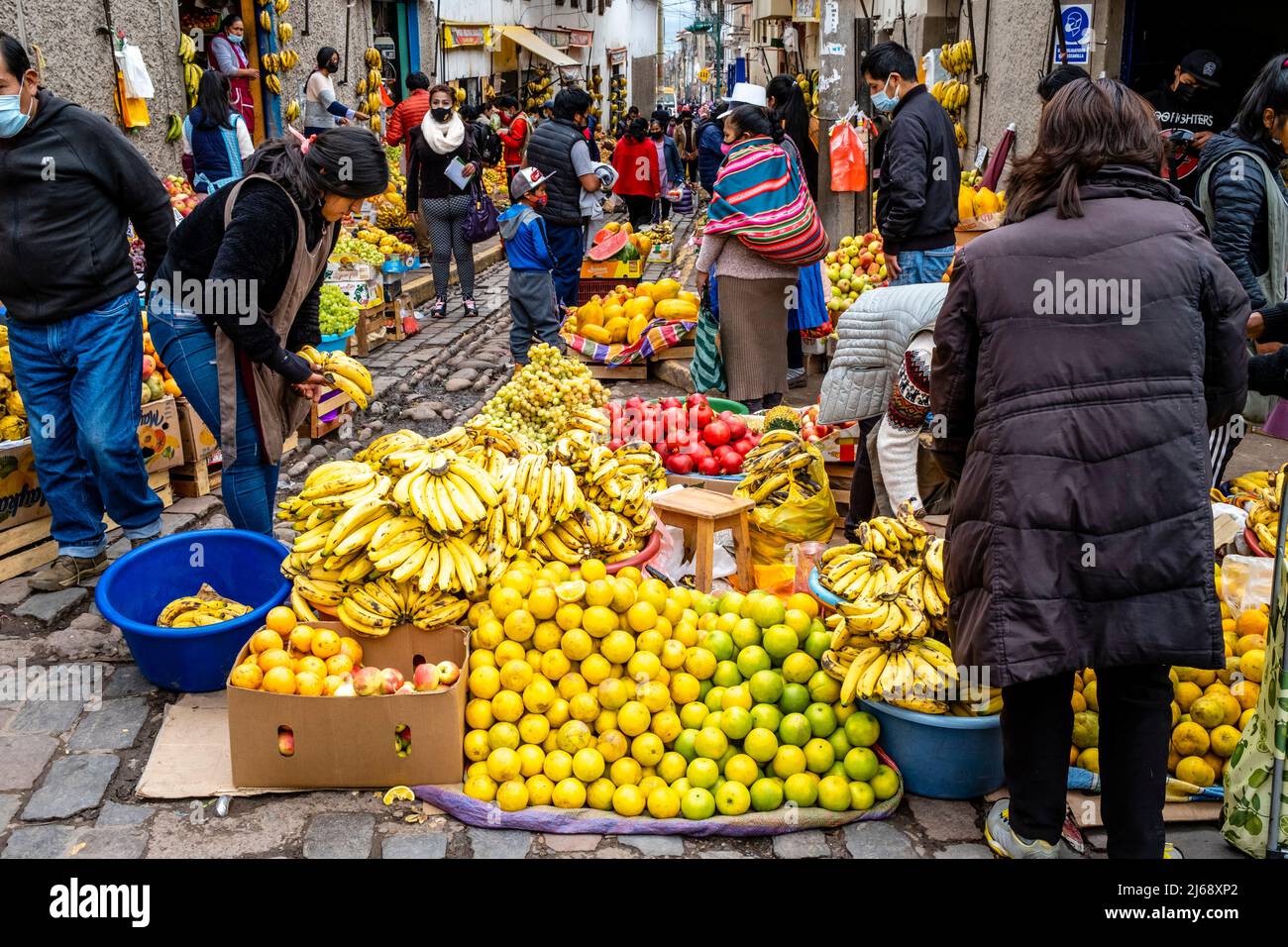Local People Shopping For Fresh Fruit and Vegetables At An Outdoor ...