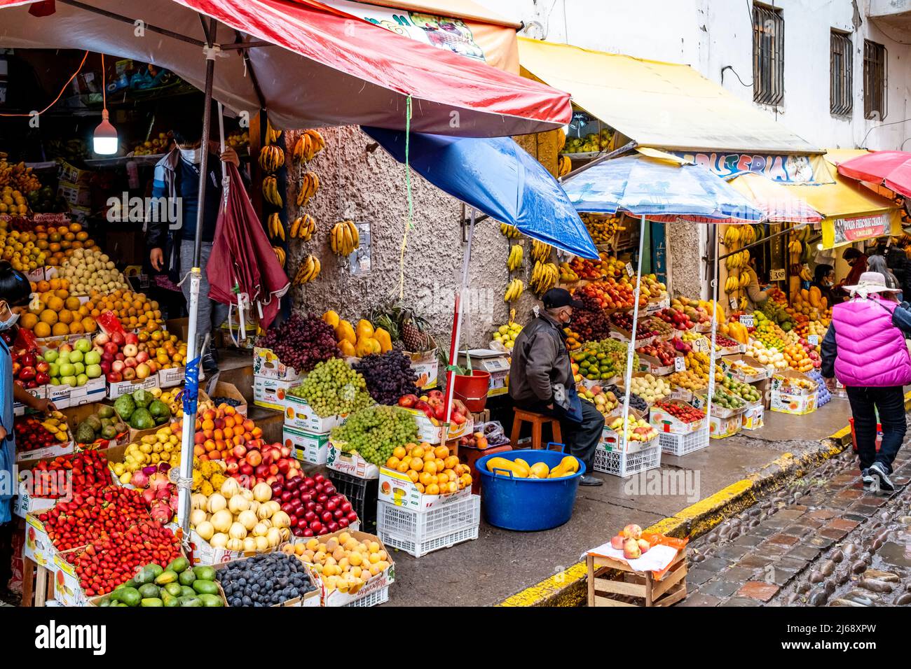 Local People Shopping For Fresh Fruit and Vegetables At An Outdoor ...