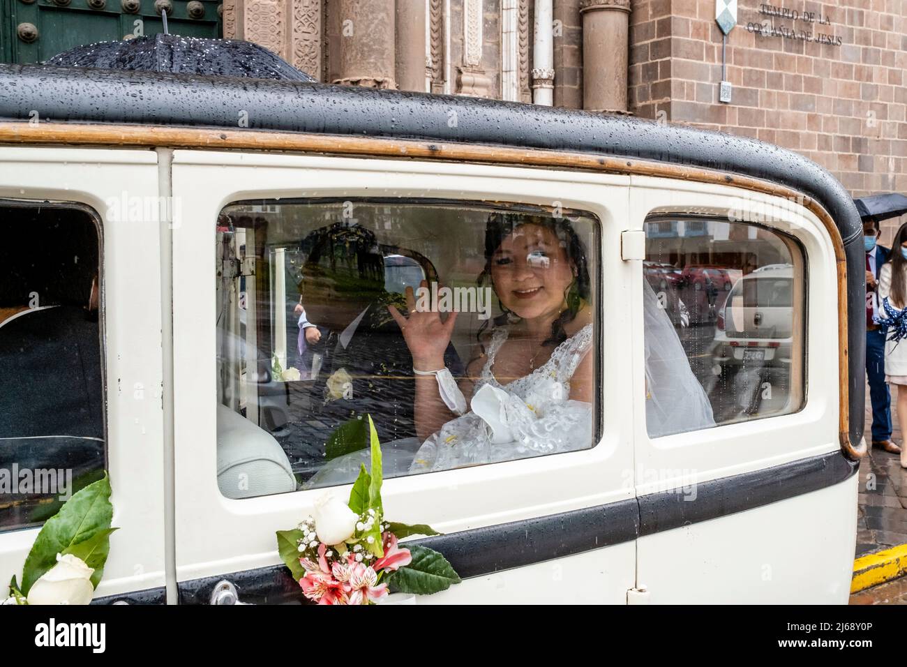 A Peruvian Bride Waves To The Guests From Her Wedding Car After Getting ...