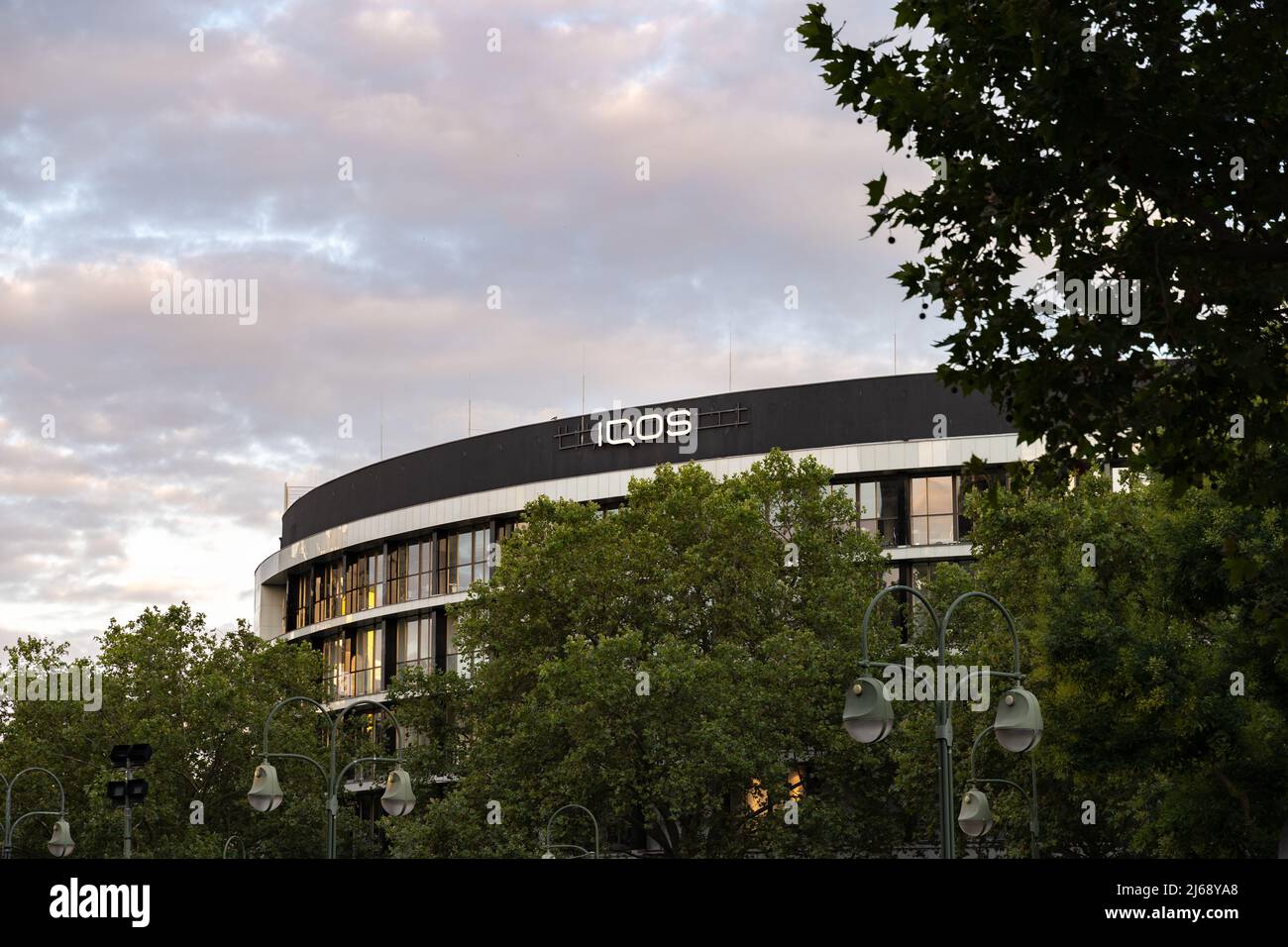 IQOS lettering on the top of a building in the capital city of Germany ...
