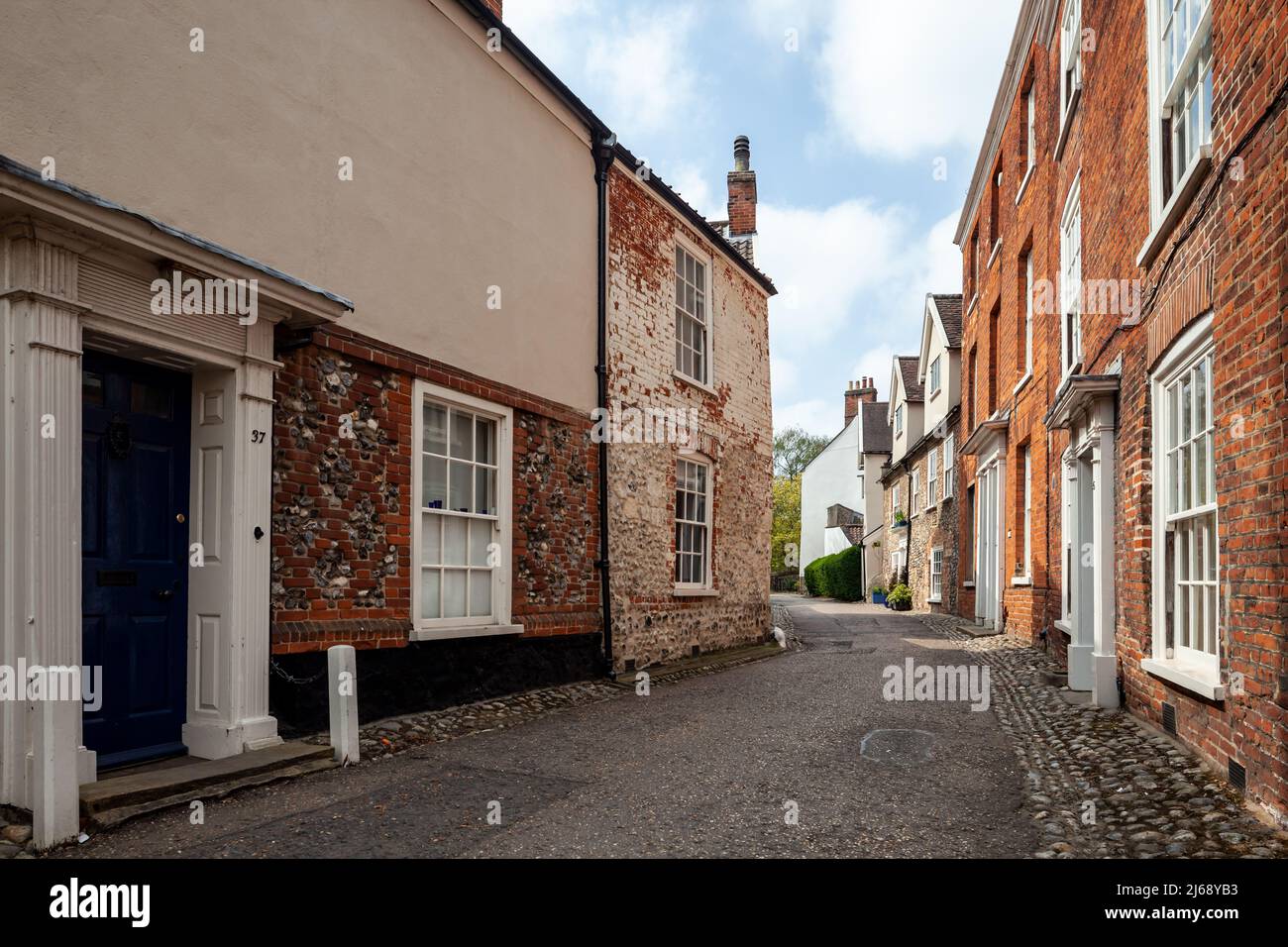 Spring afternoon on Hook's Walk in the historic centre of Norwich ...