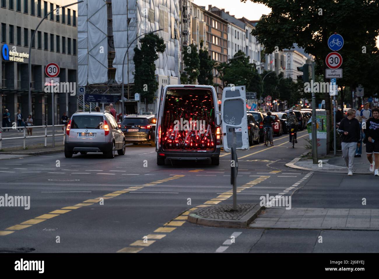 Electric scooters getting loaded up into a van for service. E-scooter ...