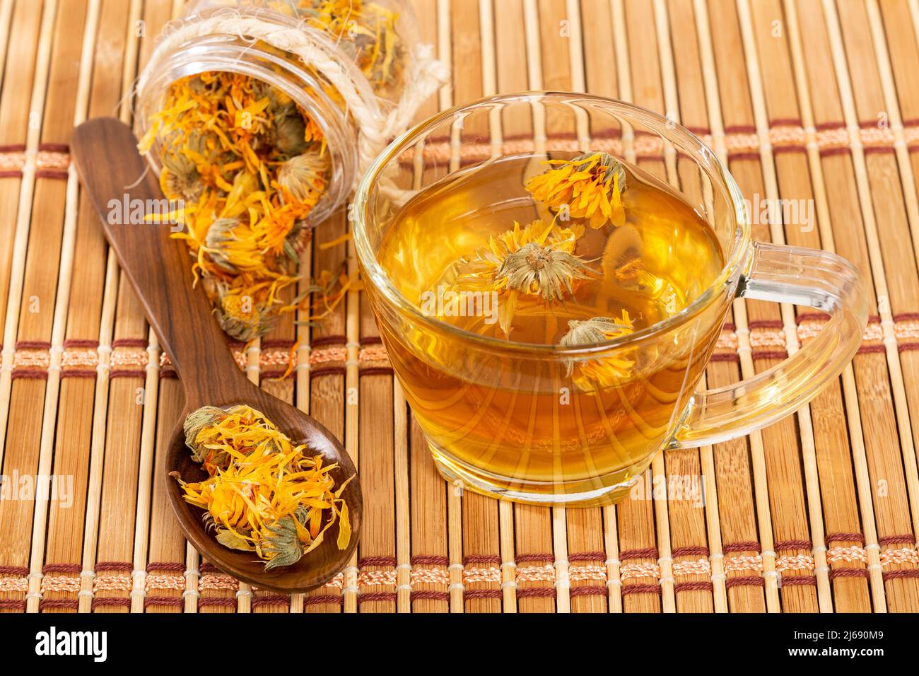Tea of dried calendula and marigold flowers hi-res stock photography ...