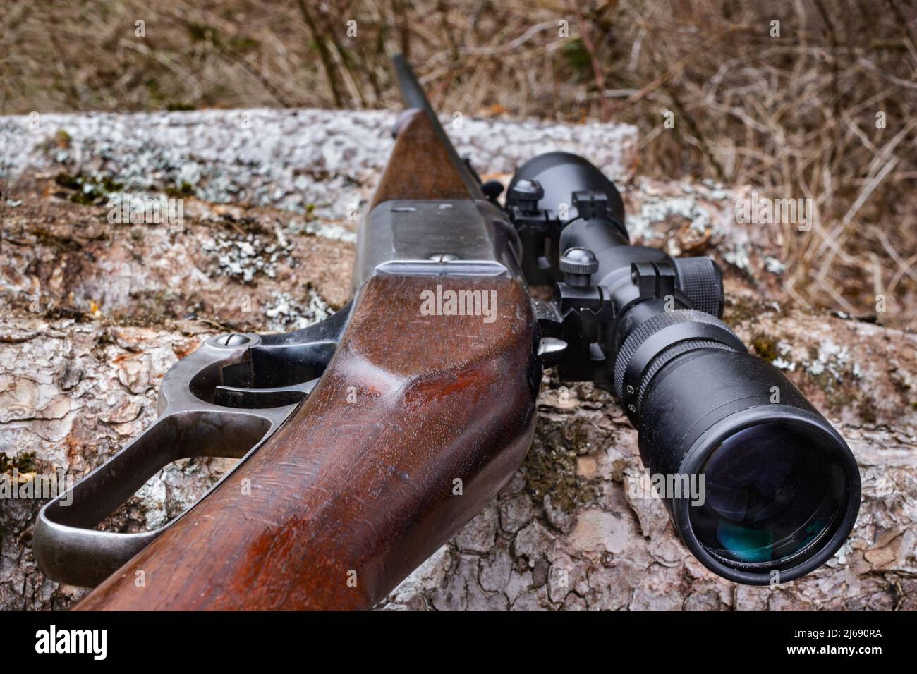 Detail shot of lever-action hunting rifle with scope Stock Photo - Alamy