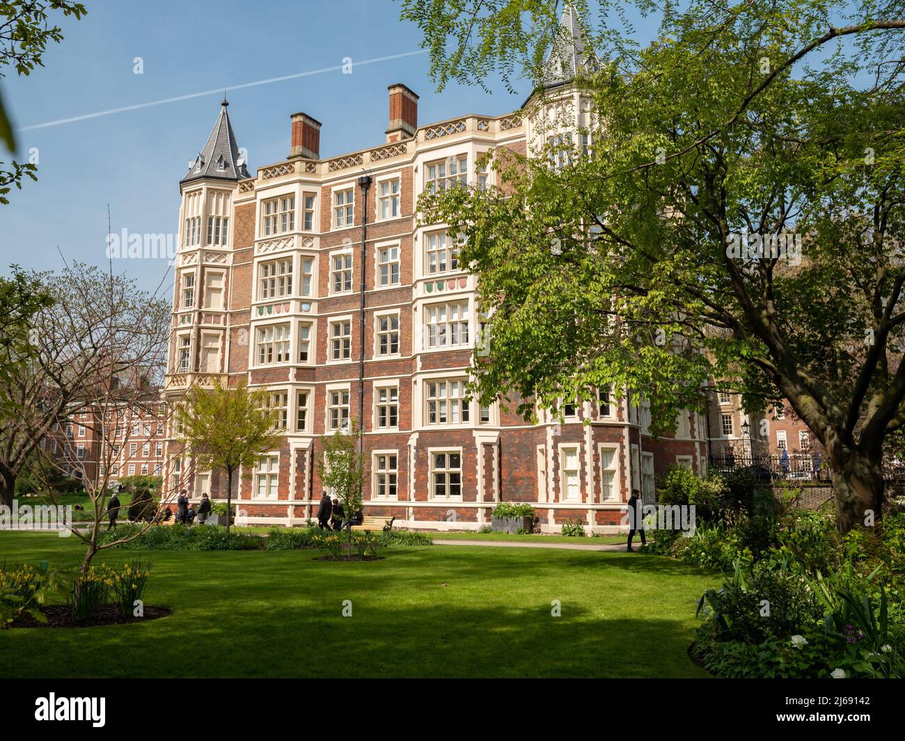 Five Paper Buildings and the green idyllic park at noon. Old ...