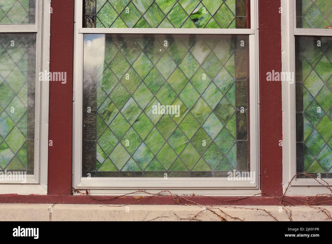 Vintage leaded glass window with diagonal lines and green glass Stock ...