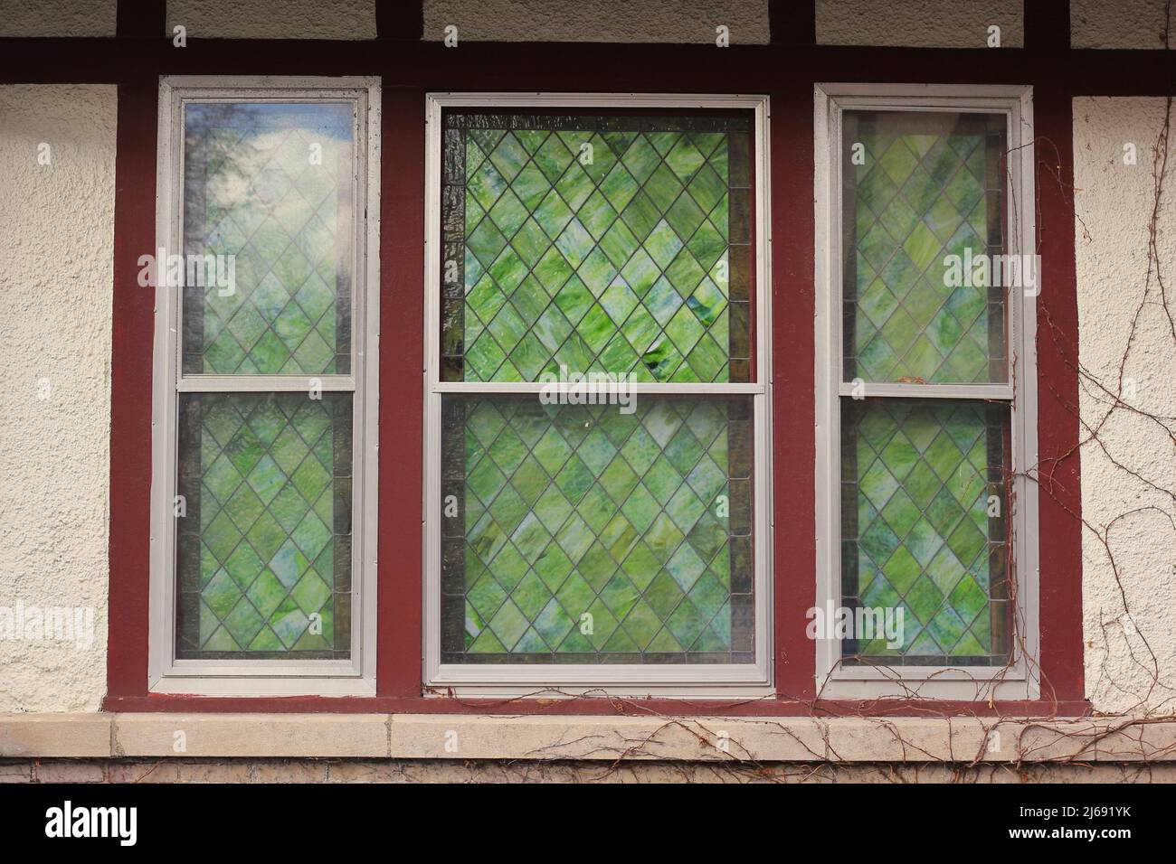 Vintage leaded glass window with diagonal lines and green glass Stock ...