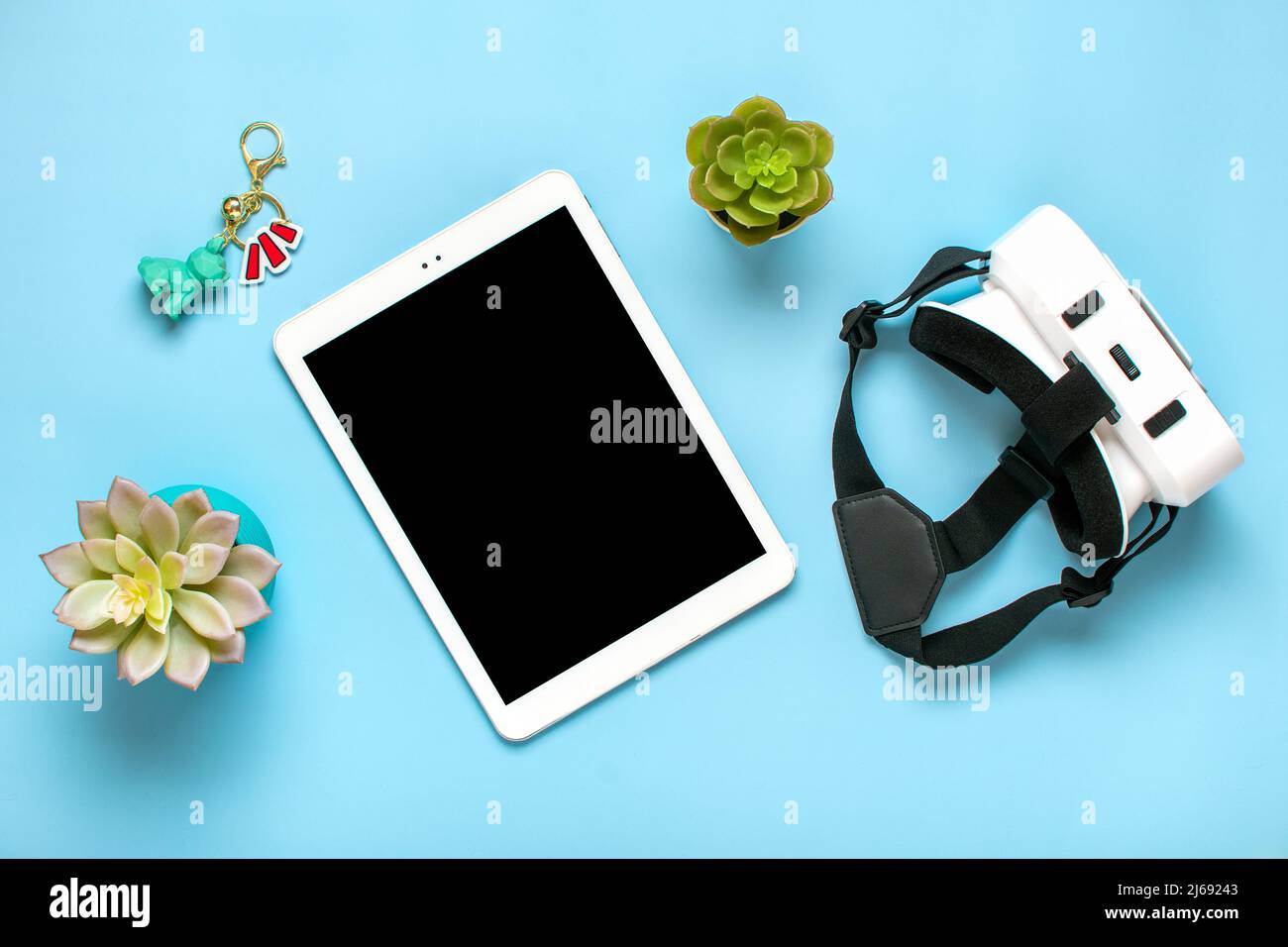 white tablet with black screen display, vr glasses for virtual reality ...