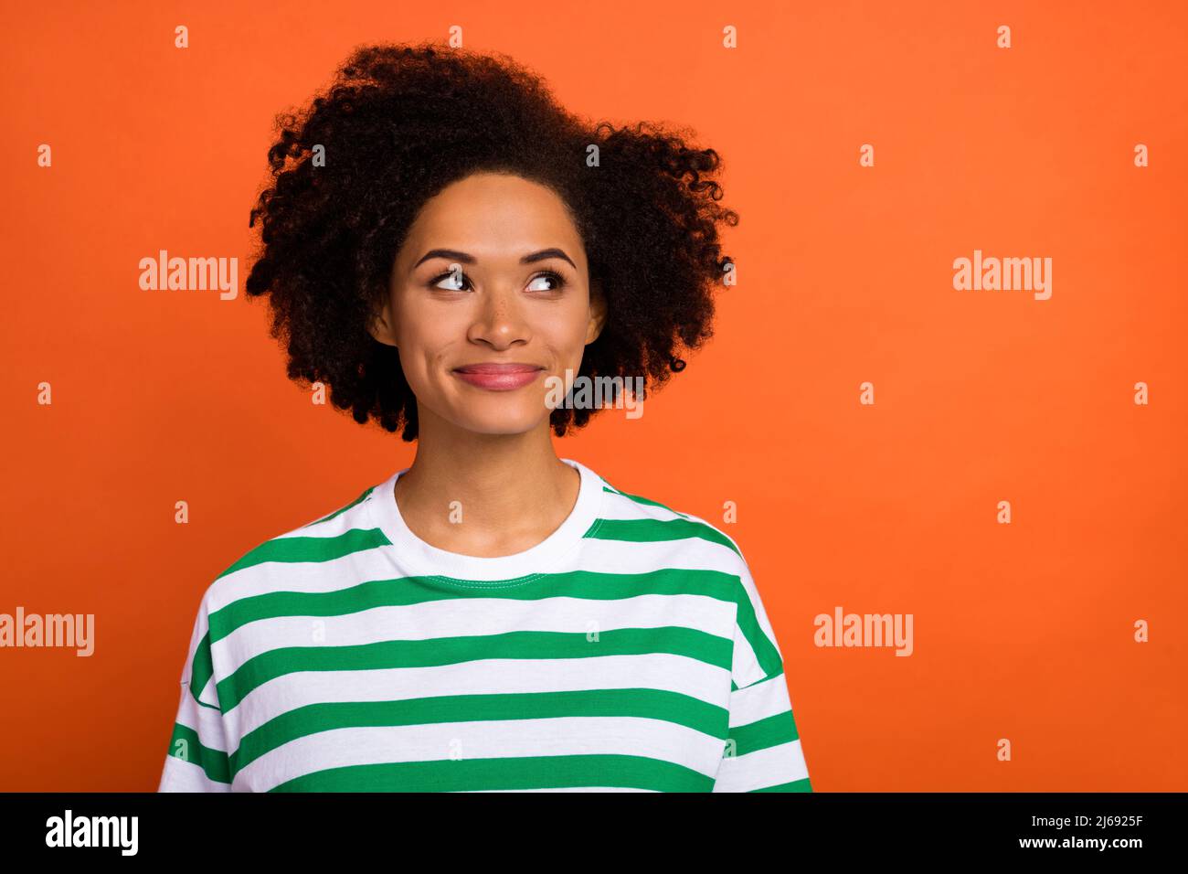 Portrait of attractive minded cheery smart girl overthinking copy blank ...