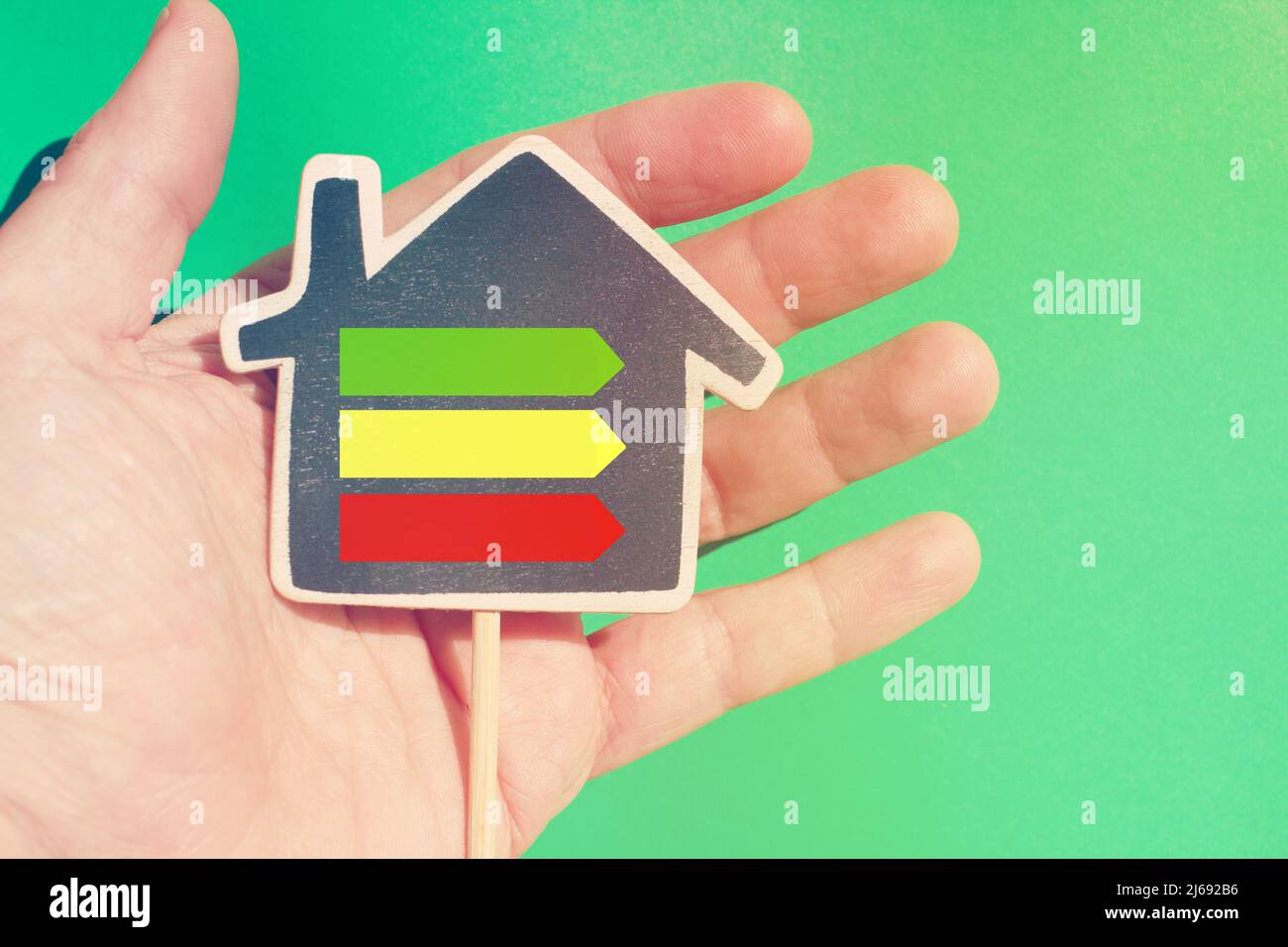 Hand holding a house with the energetic classification arrows Stock ...