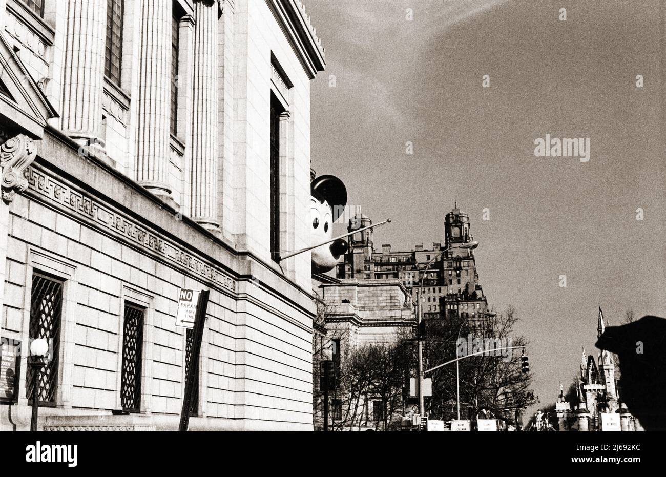 A mysterious moment on Central Park West as a Giant Mickey Mouse rounds ...