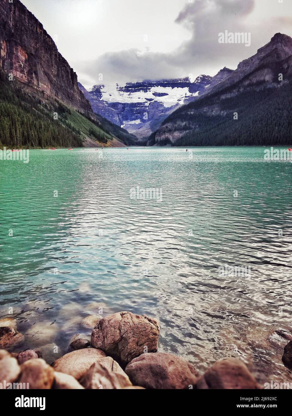 Lake Louise Canada mountains cloud water rocks. High-quality photo ...
