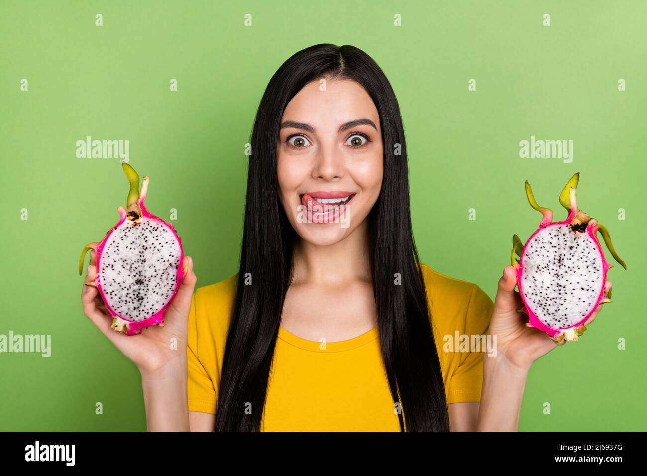 Photo of tricky cunning lady dressed yellow t-shirt holding exotic ...