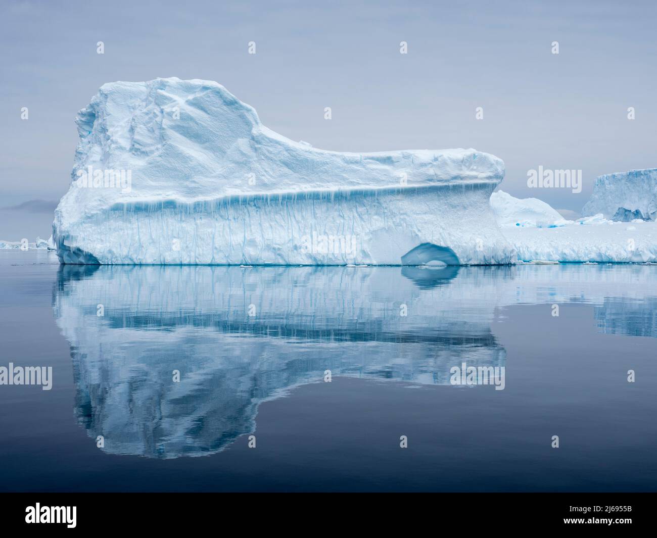Large iceberg grounded on a reef at Peter I Island, Bellingshausen Sea ...