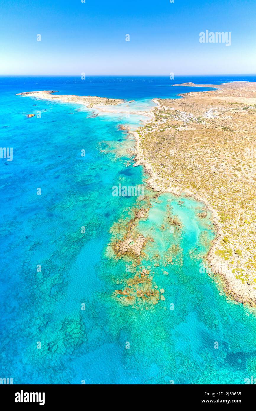 Aerial view of crystal transparent sea washing the sand beach of ...