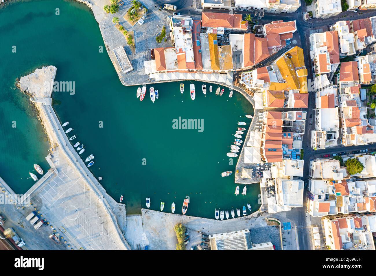 Aerial view of the old town and Venetian harbour overlooking the blue ...