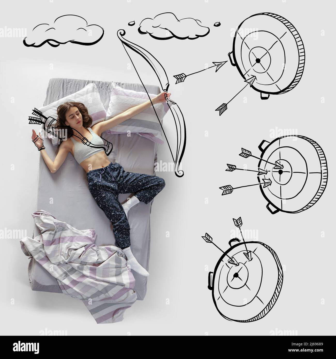 Creative image. Young woman lying on bed, sleeping, dreaming about ...