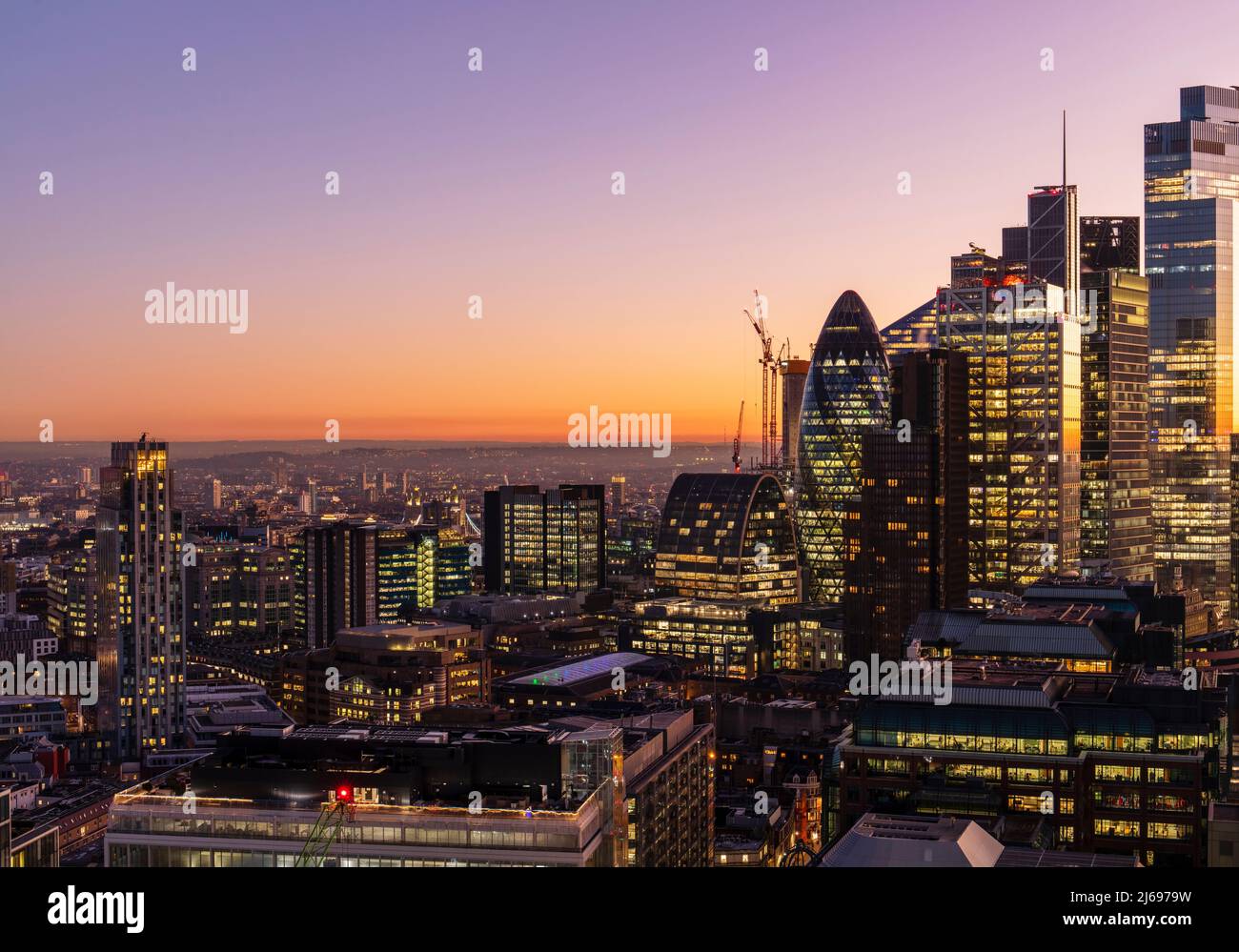 Aerial view of London skyline at sunset, including City of London ...