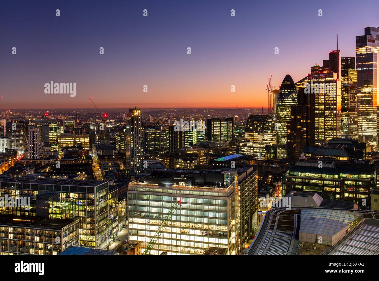 Aerial view of London skyline at sunset, including City of London ...