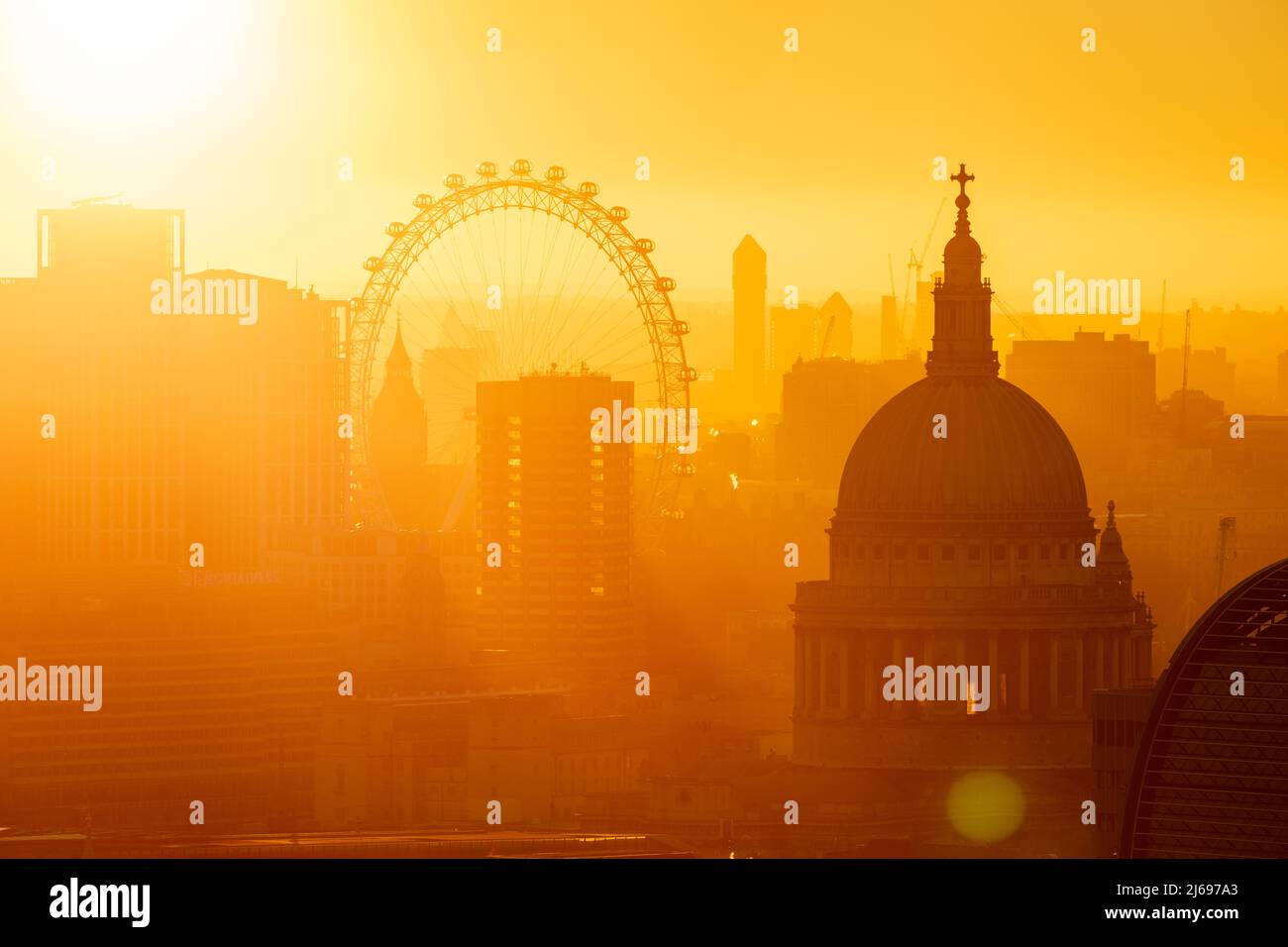 Aerial view of London skyline at sunset, including London Eye and St ...