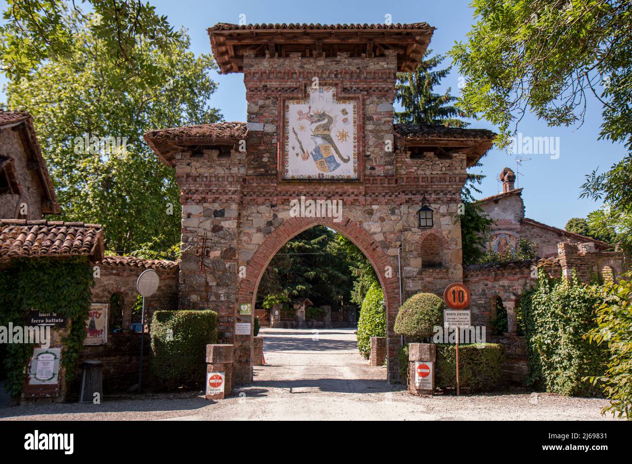 Ancient entry gate arch of the village of Grazzano Visconti, Emilia ...