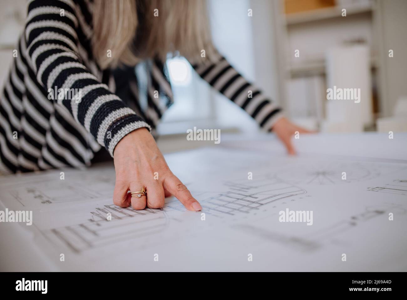 Engineer woman blueprints hi-res stock photography and images - Alamy