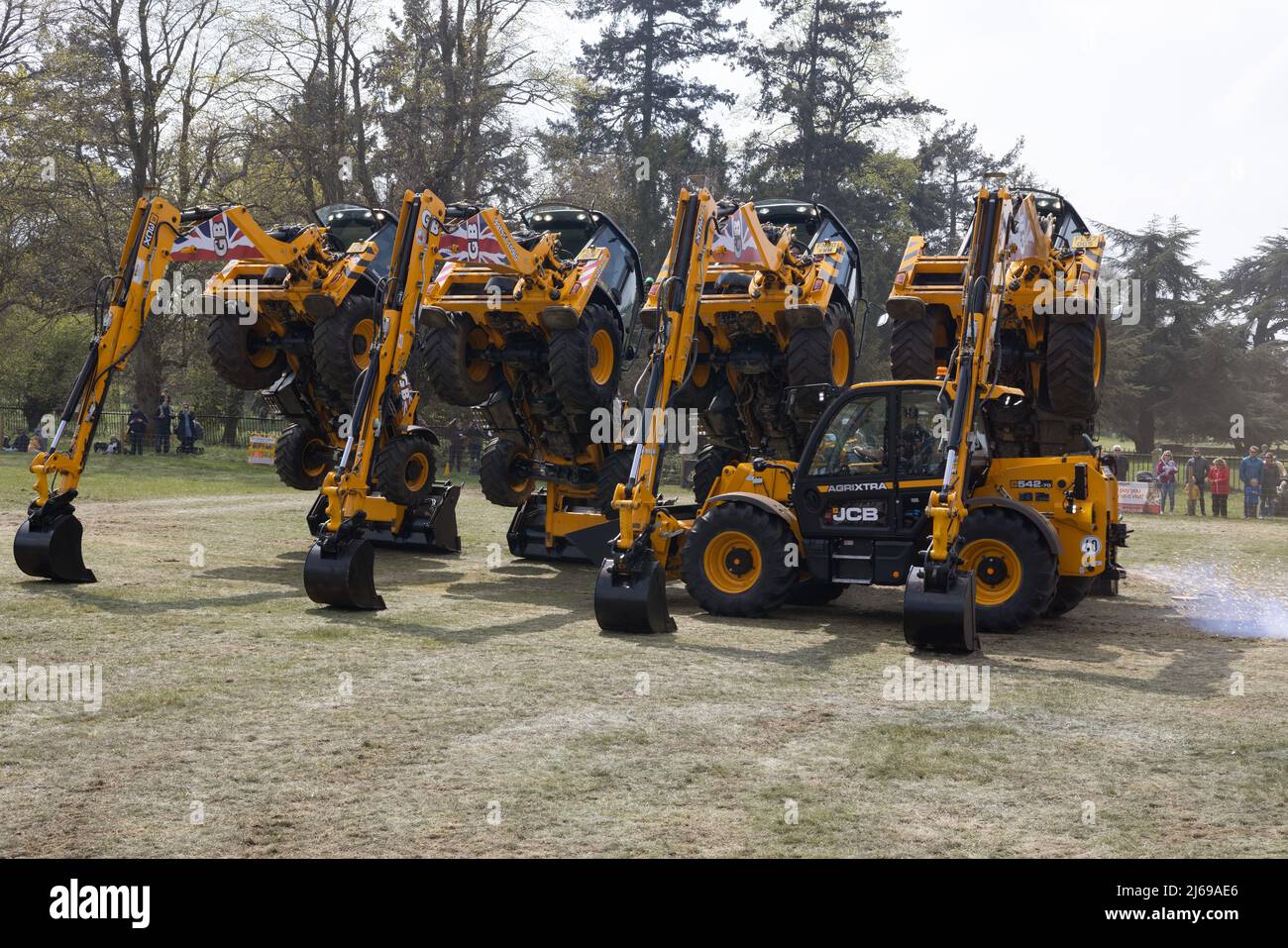 JCB Dancing Diggers display team - heavy machinery showing what it can ...